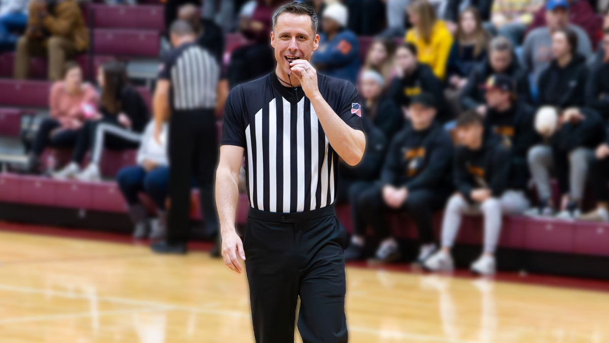 Knowing, interpreting rules helps day job as banker, sideline as hoops ...